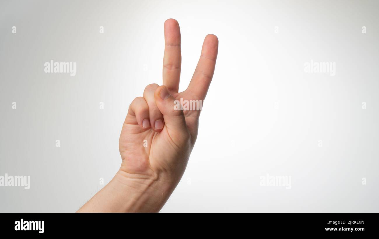 Men's hands gesture counting on fingers two palmar side Stock Photo - Alamy