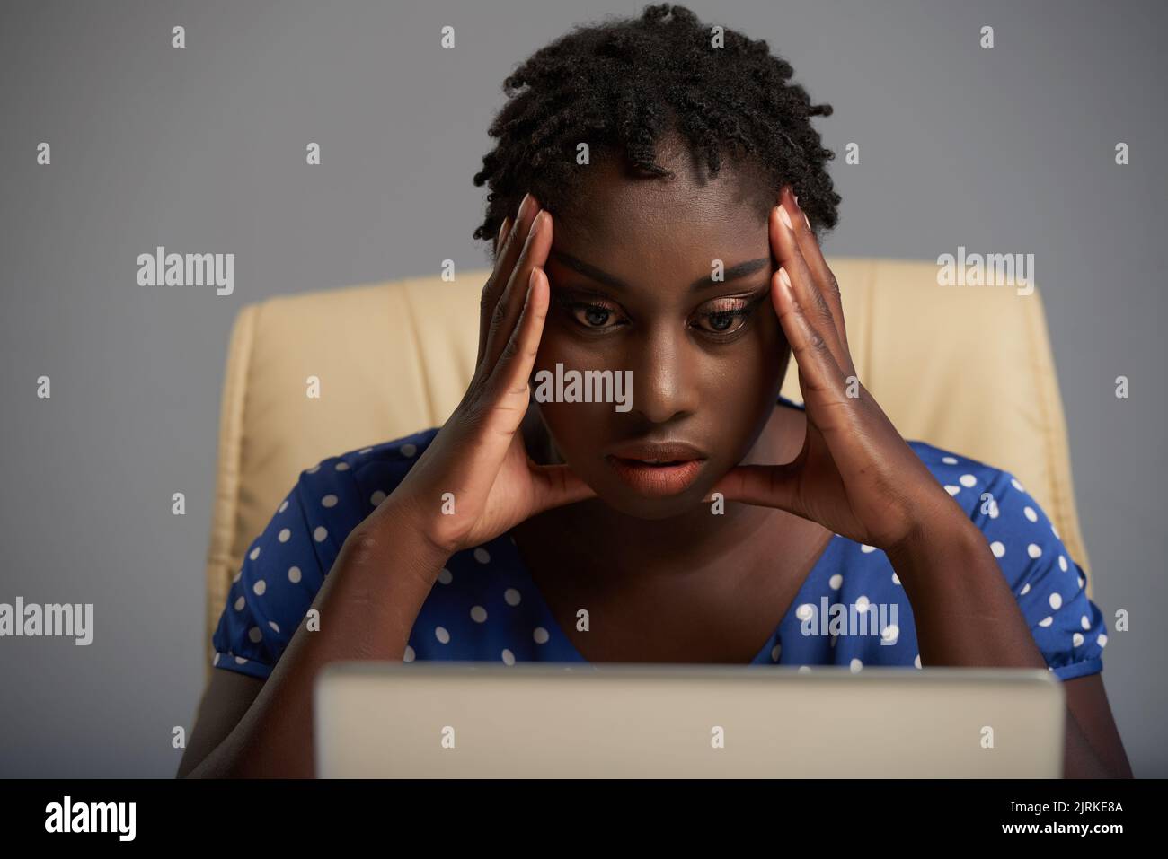 Stressed pretty business woman reading news on laptop screen Stock ...