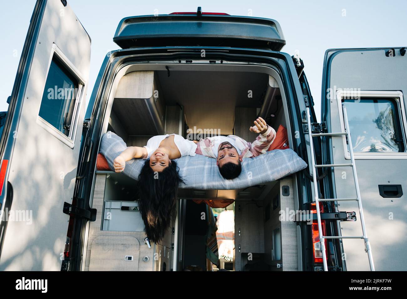 Couple lying in bed low hi-res stock photography and images - Alamy