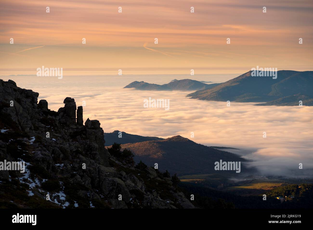 Natural landscape with dark rocky mountains and hills towering over ...