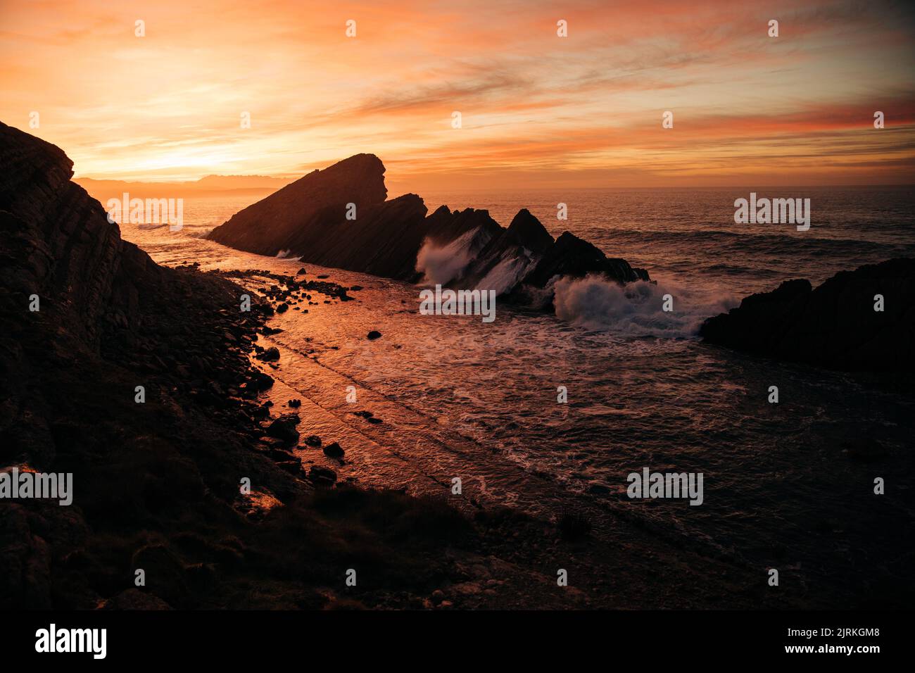 Magnificent views of the Somocuevas beach in Spain at sunset Stock ...