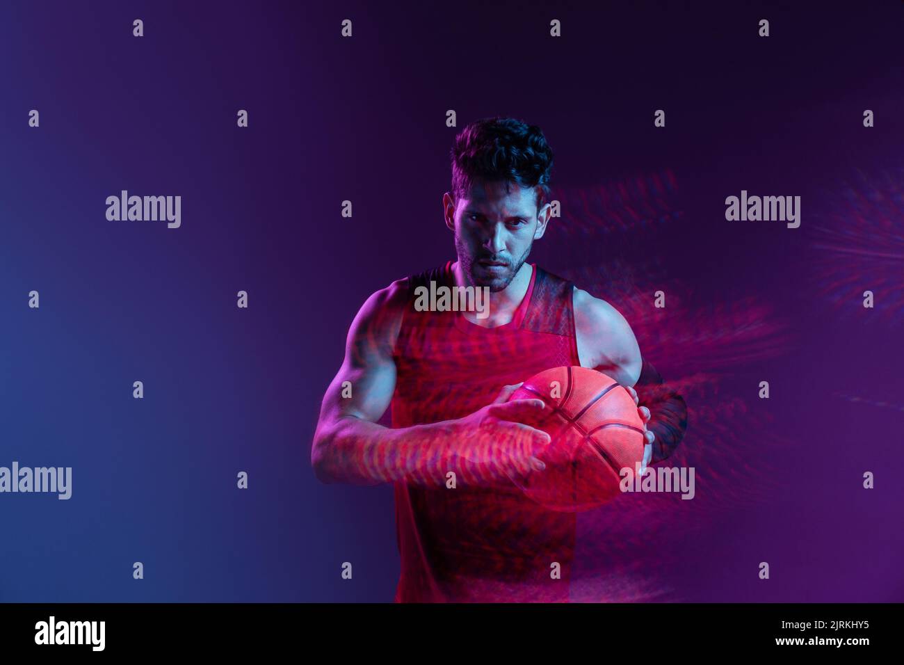 Creative studio shot of basketball player in the studio using color ...