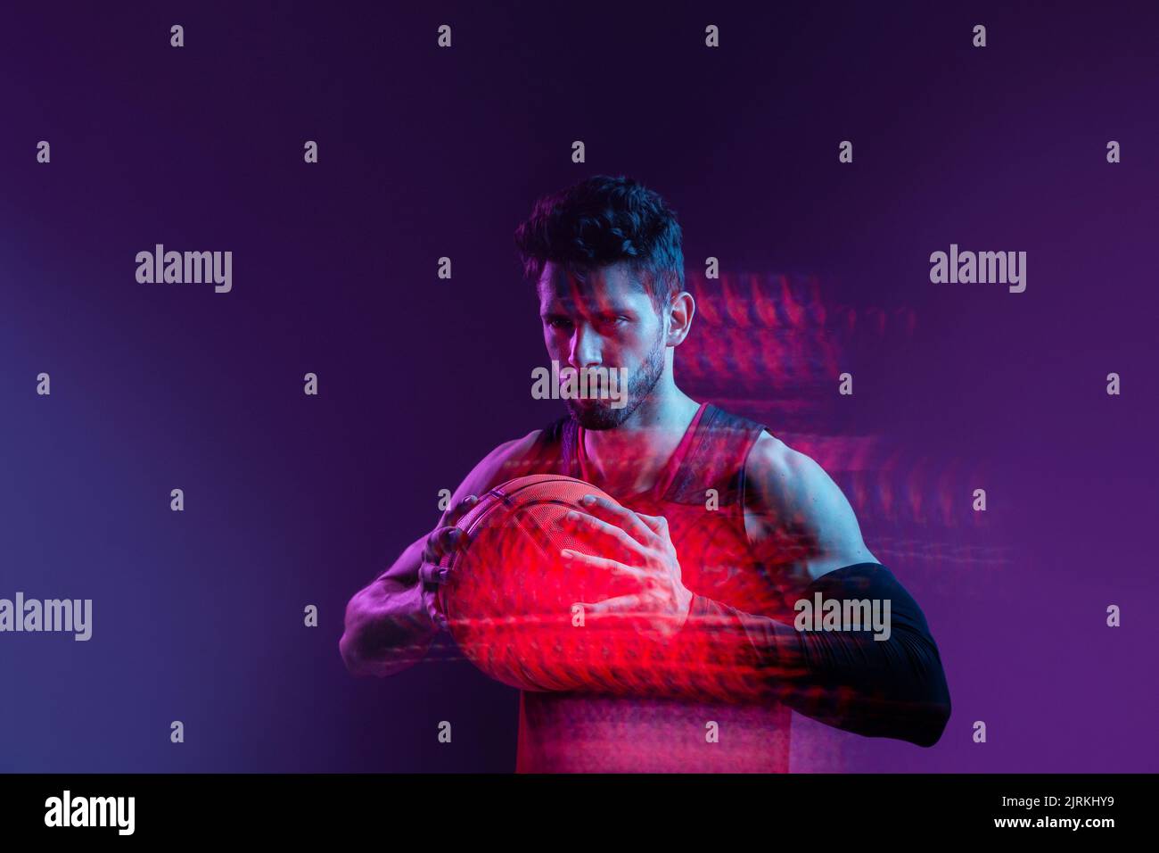 Creative studio shot of basketball player in the studio using color ...