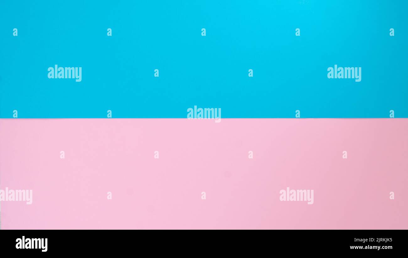 Two-tone background is divided in half - blue and pink Stock Photo - Alamy