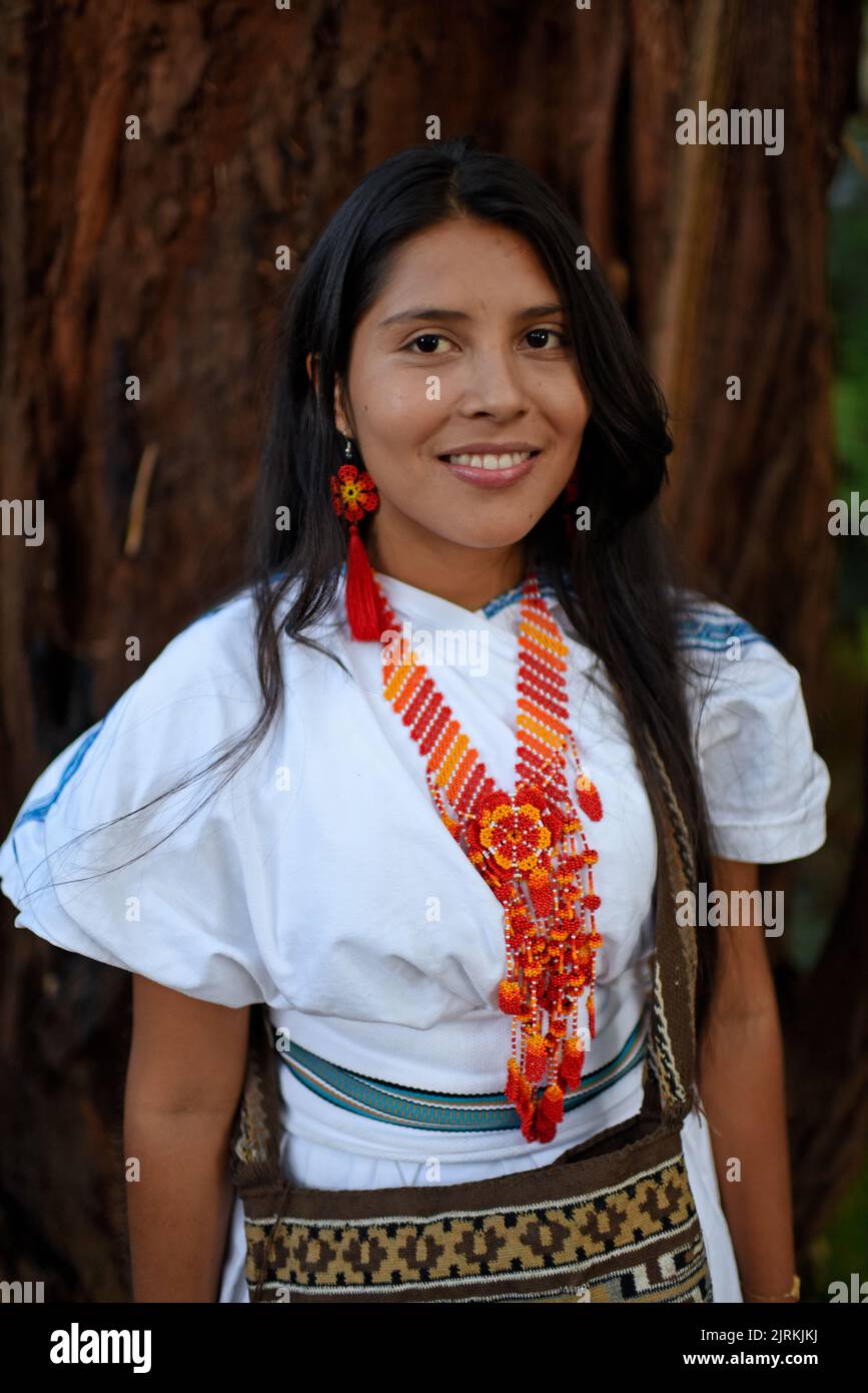Portrait of a happy young Arhuaco indigenous woman in a forest of ...