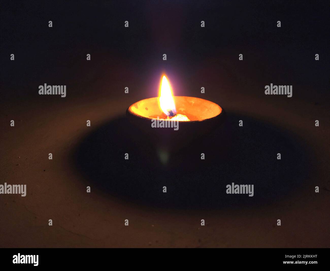Traditional clay diya lamps lit during diwali celebration Stock Photo ...