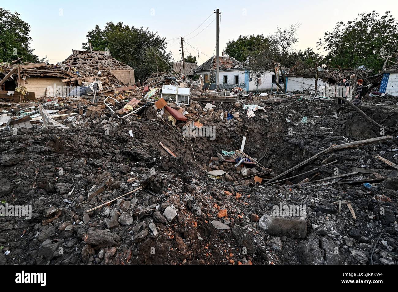 CHAPLYNE, UKRAINE - AUGUST 24, 2022 - A crater in a residential ...