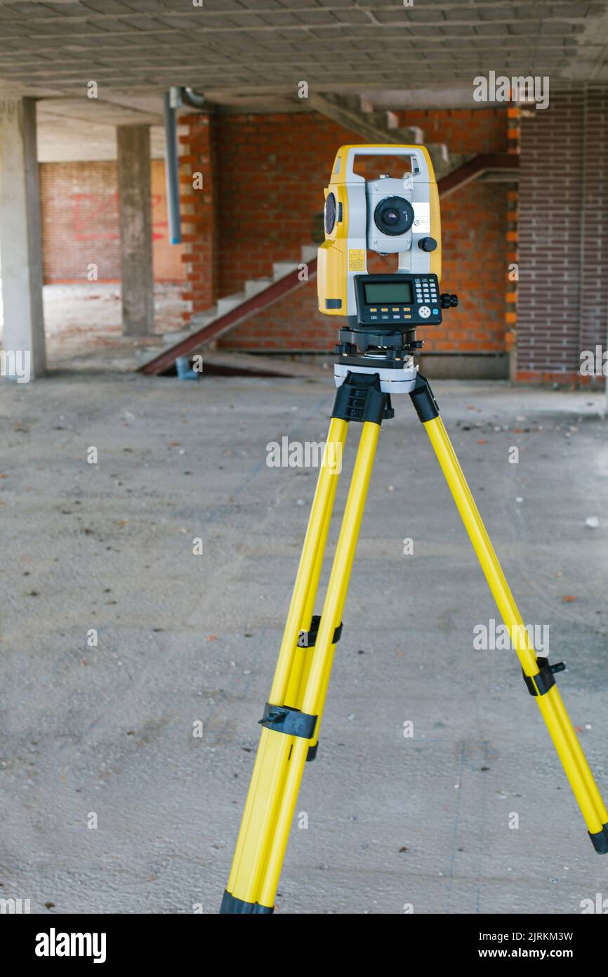 Measuring equipment (total station) at construction site prepared for ...