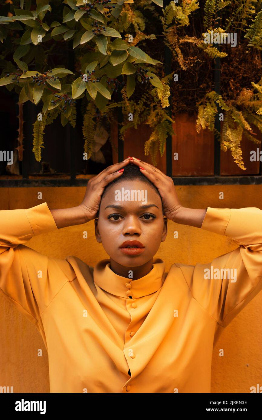 African american looking over wall hi-res stock photography and images ...