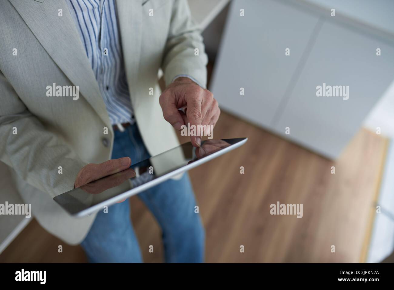 Cropped image of entrepreneur analyzing data on tablet computer Stock ...