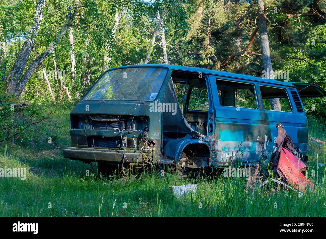 Old, damaged car. Abandoned car in the woods.Defective car. A car unfit ...
