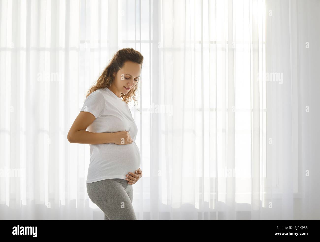 Maternity belly hi-res stock photography and images - Alamy