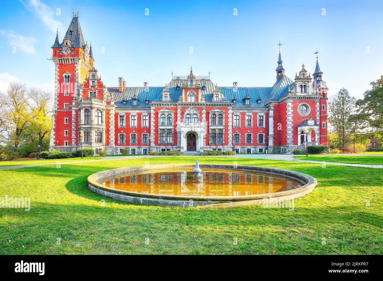 Fabulous autumn landscape with Plawniowice palace. Popular tourist ...