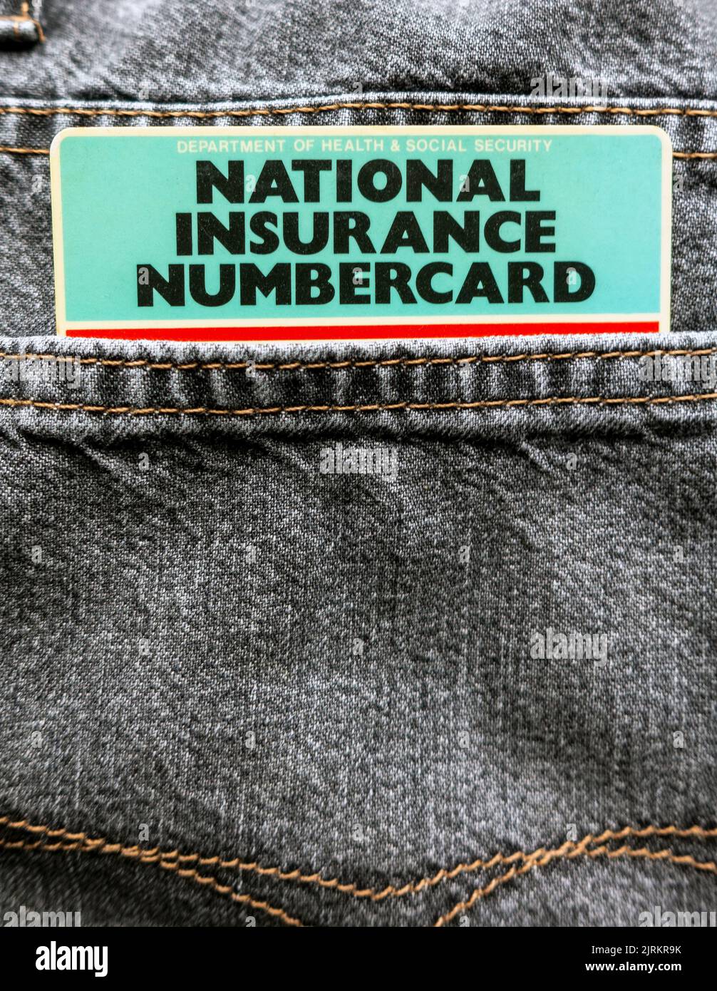 National insurance numbercard displayed in jean pocket Stock Photo - Alamy