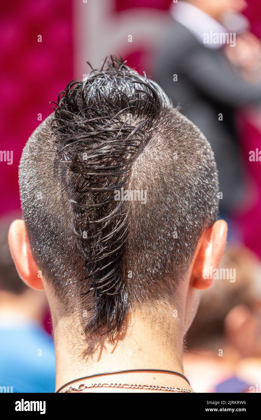 Head of a man seen from behind, showing an original hairstyle Stock ...
