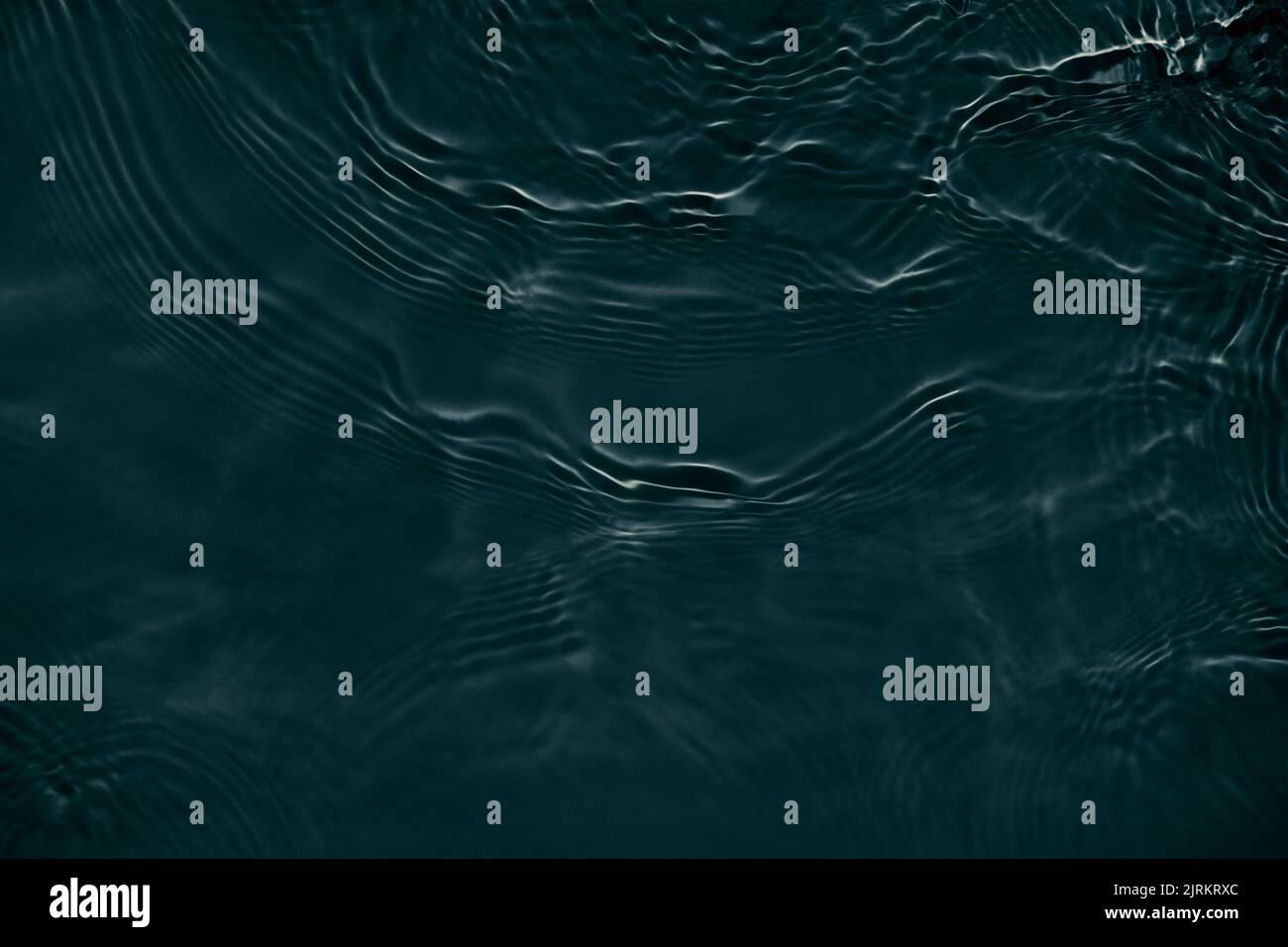 black transparent clear calm water surface texture Stock Photo - Alamy