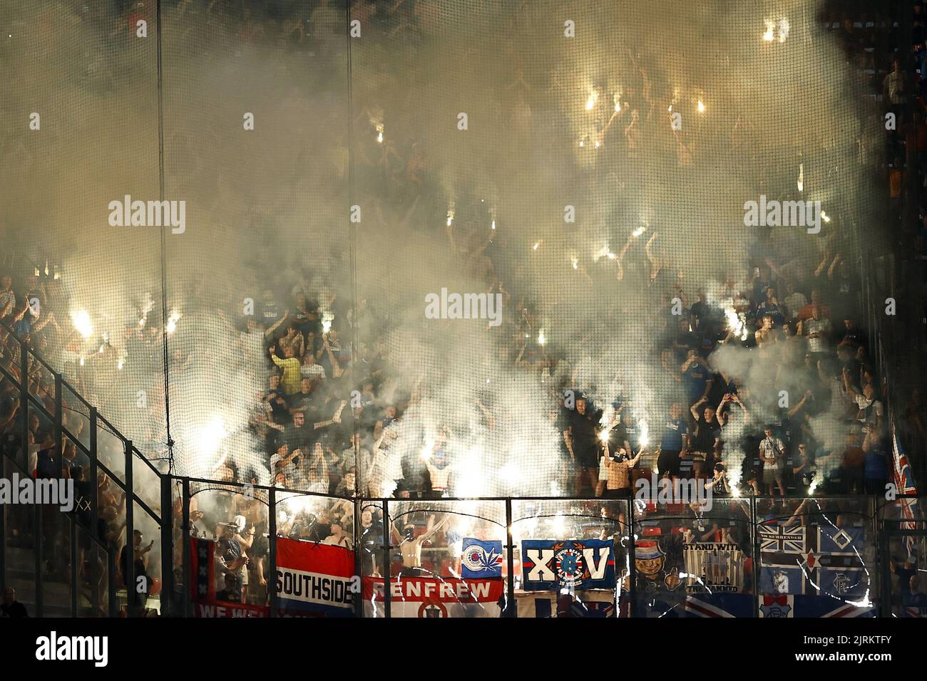 EINDHOVEN - Rangers FC fans with fireworks during the UEFA Champions ...