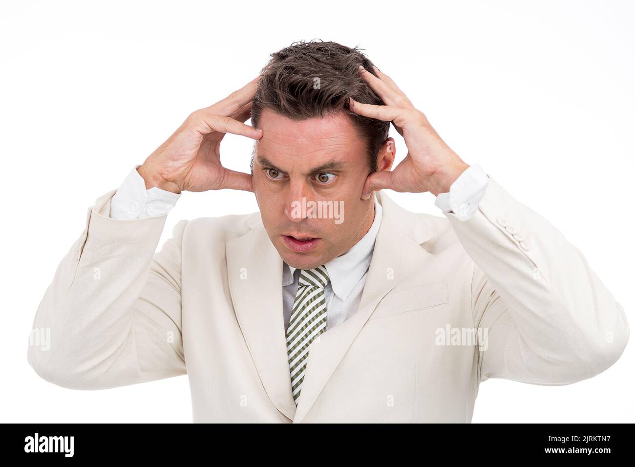 Stressed business executive shocked by his problems Stock Photo - Alamy