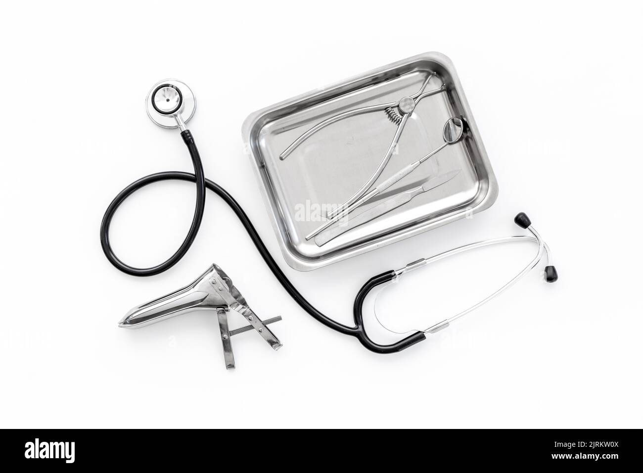 Dental or surgical steel instruments with stethoscope. Healthcare ...