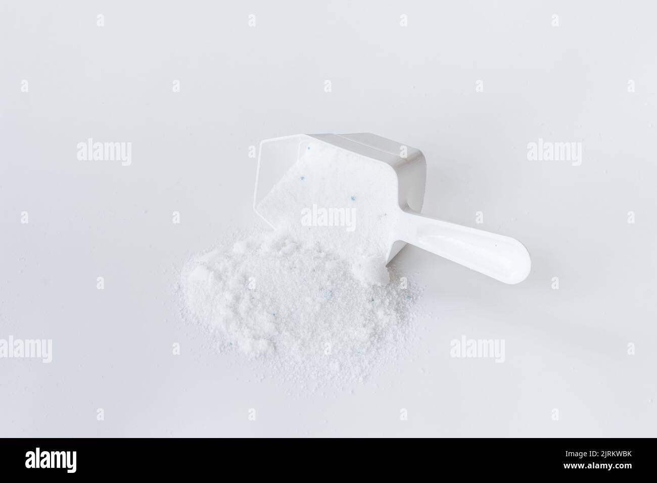 White laundry detergents powder with cup for laundry Stock Photo - Alamy