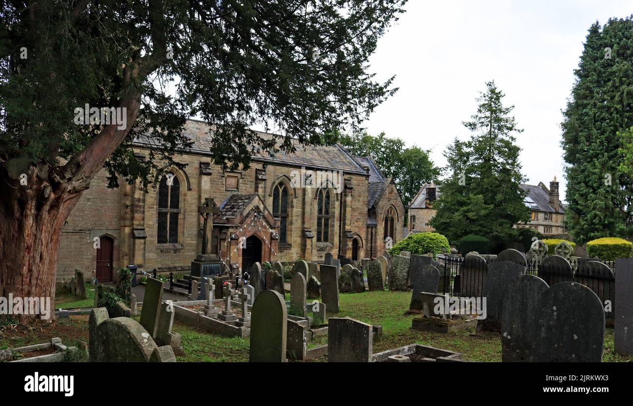 The church and grave yard with a big old yew tree of St John the ...