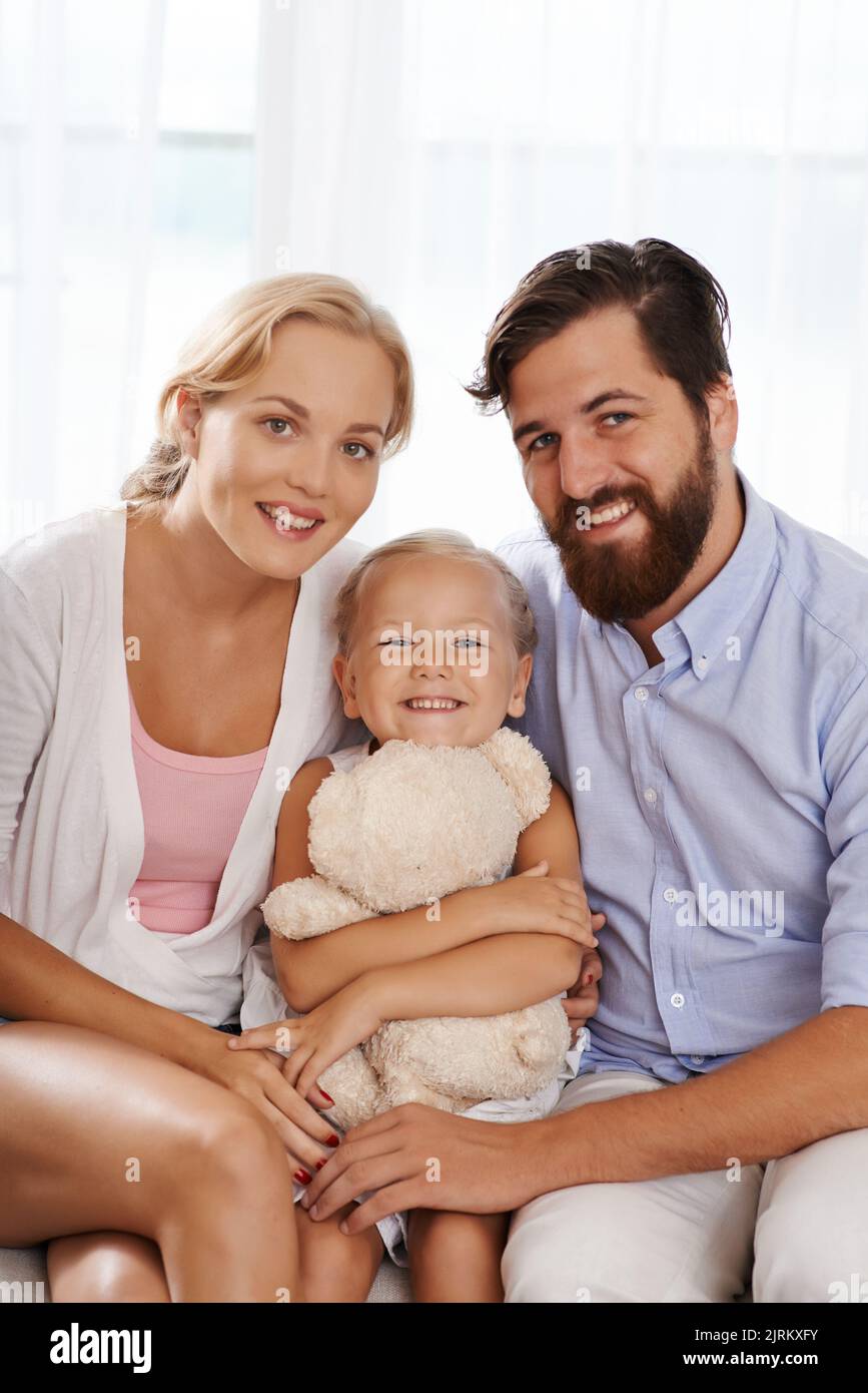 Happy family of three with little baby girl Stock Photo - Alamy