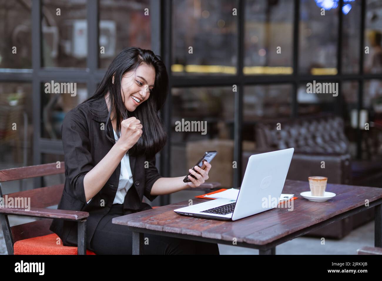 Excited beautiful female executive manager hi-res stock photography and ...