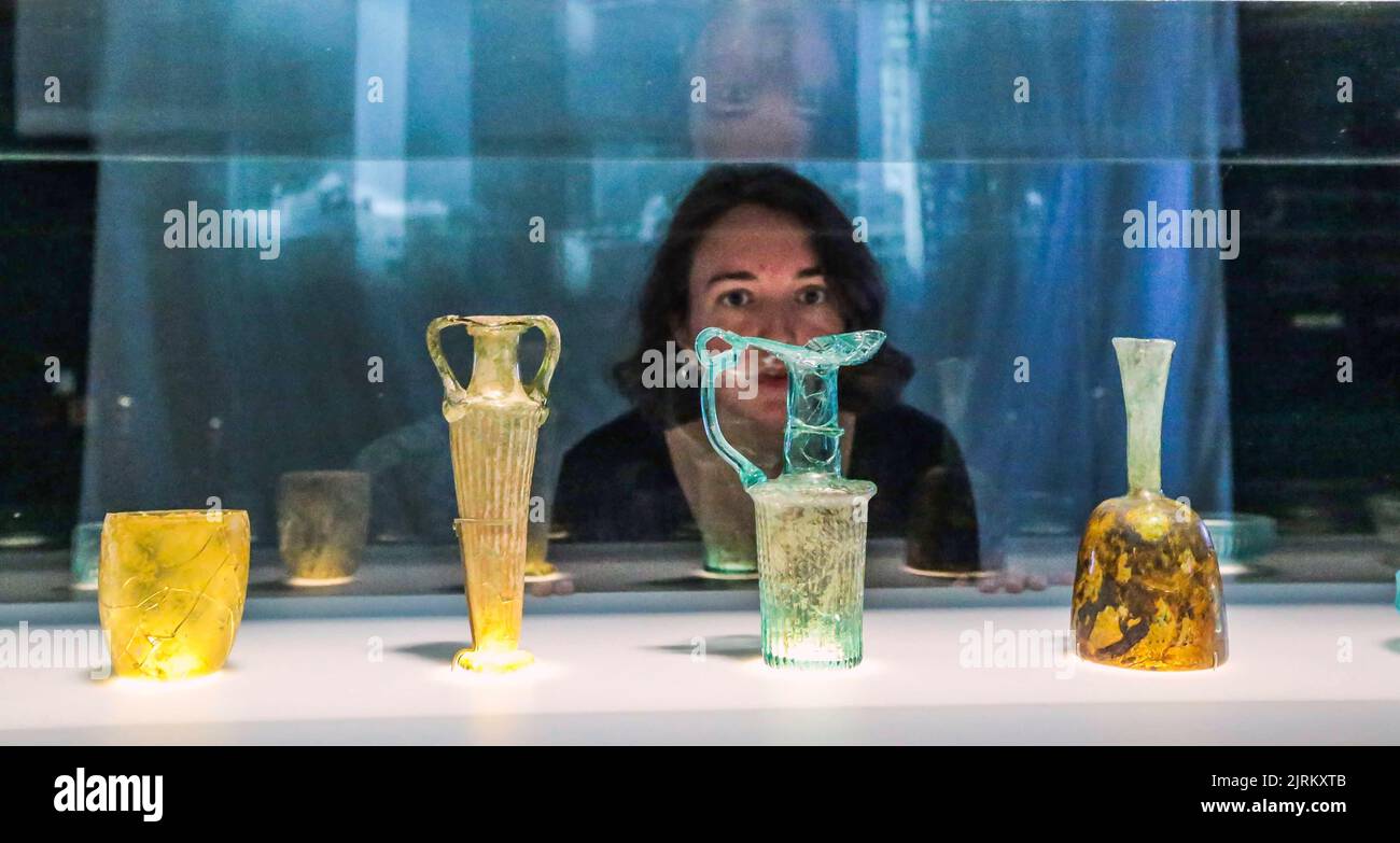 London UK 25 August 2022 From left to Right , Roman beaker, 1st century ...