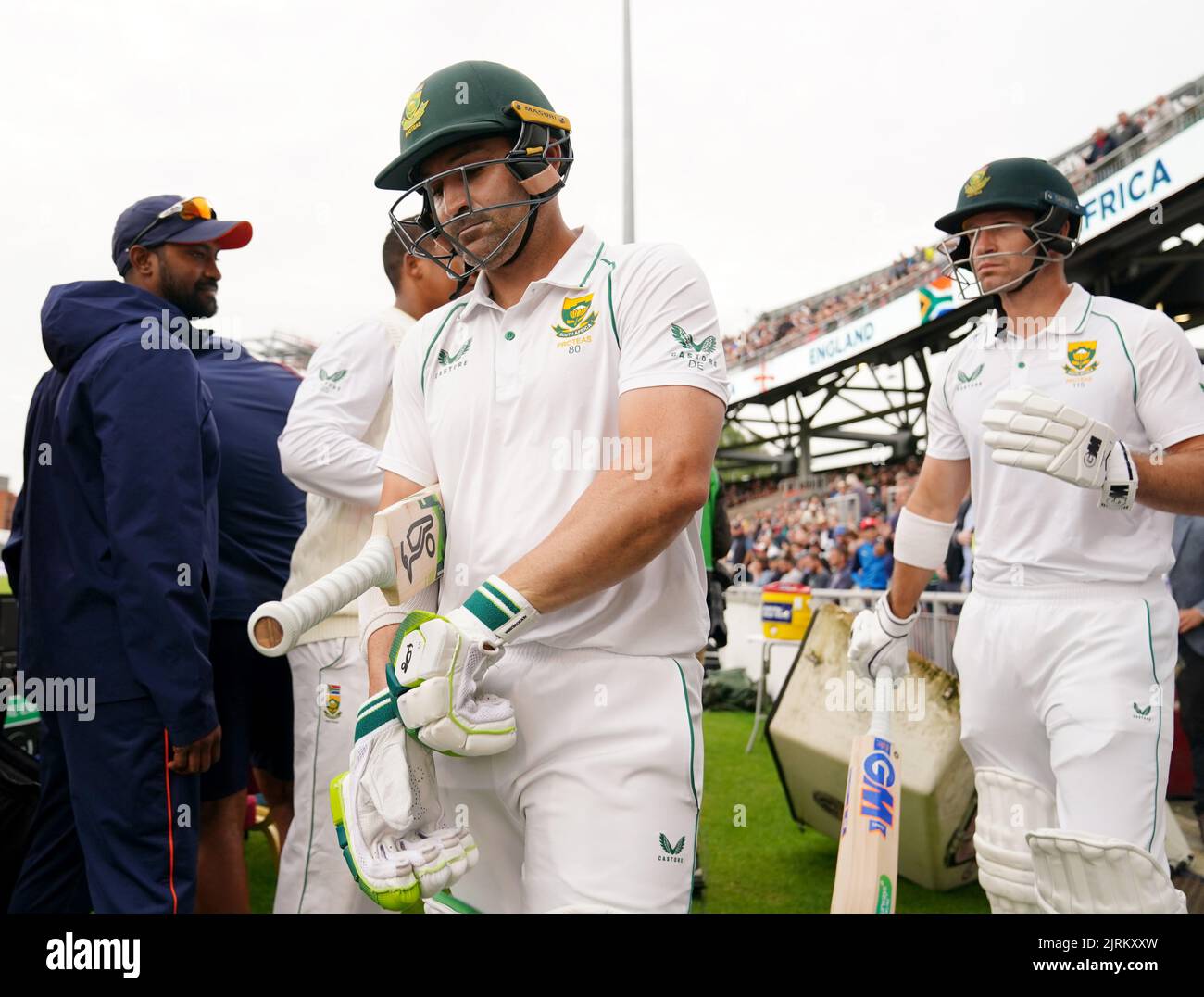 South Africa openers Dean Elgar (left) and Sarel Erwee make their way ...