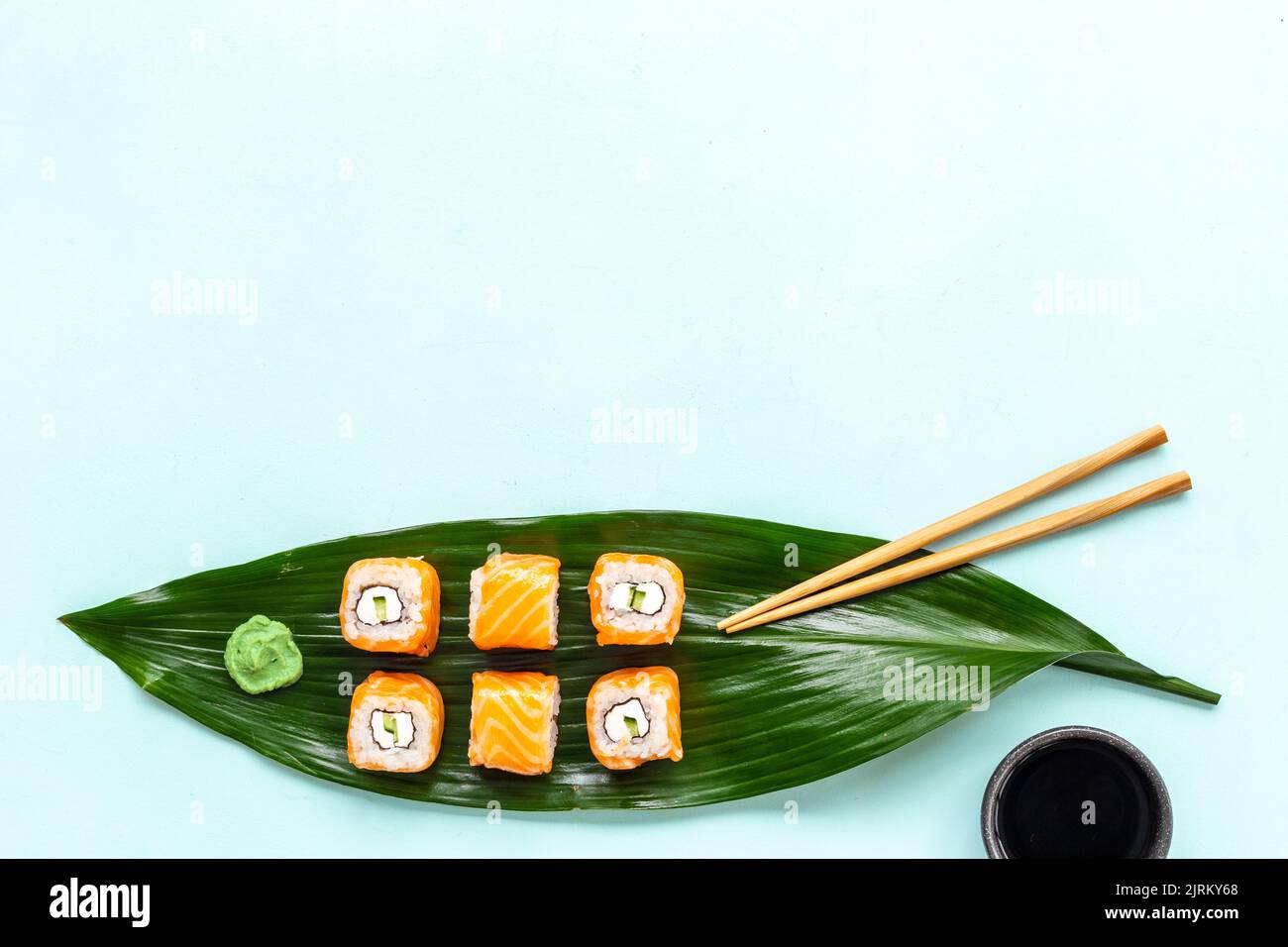 Salmon sushi rolls set on Bamboo leave, top view. Eco serving Stock ...