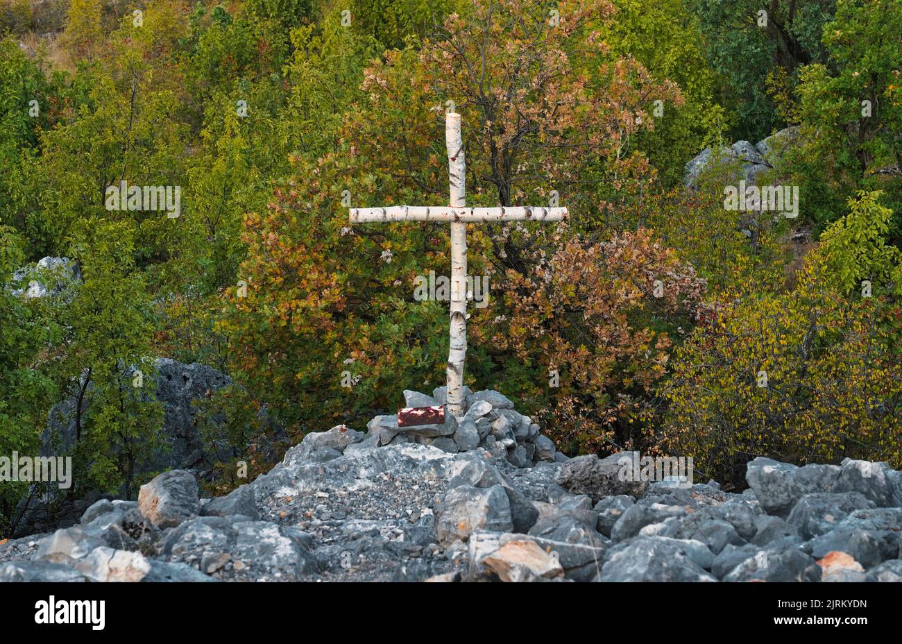 Wooden cross on mountain top hi-res stock photography and images - Alamy