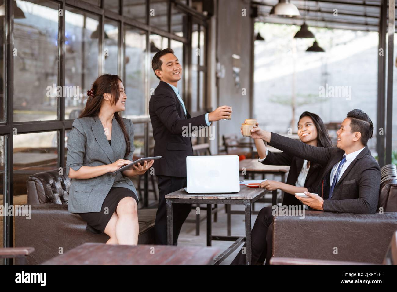 relaxed business worker after finishing the meeting with partner Stock ...