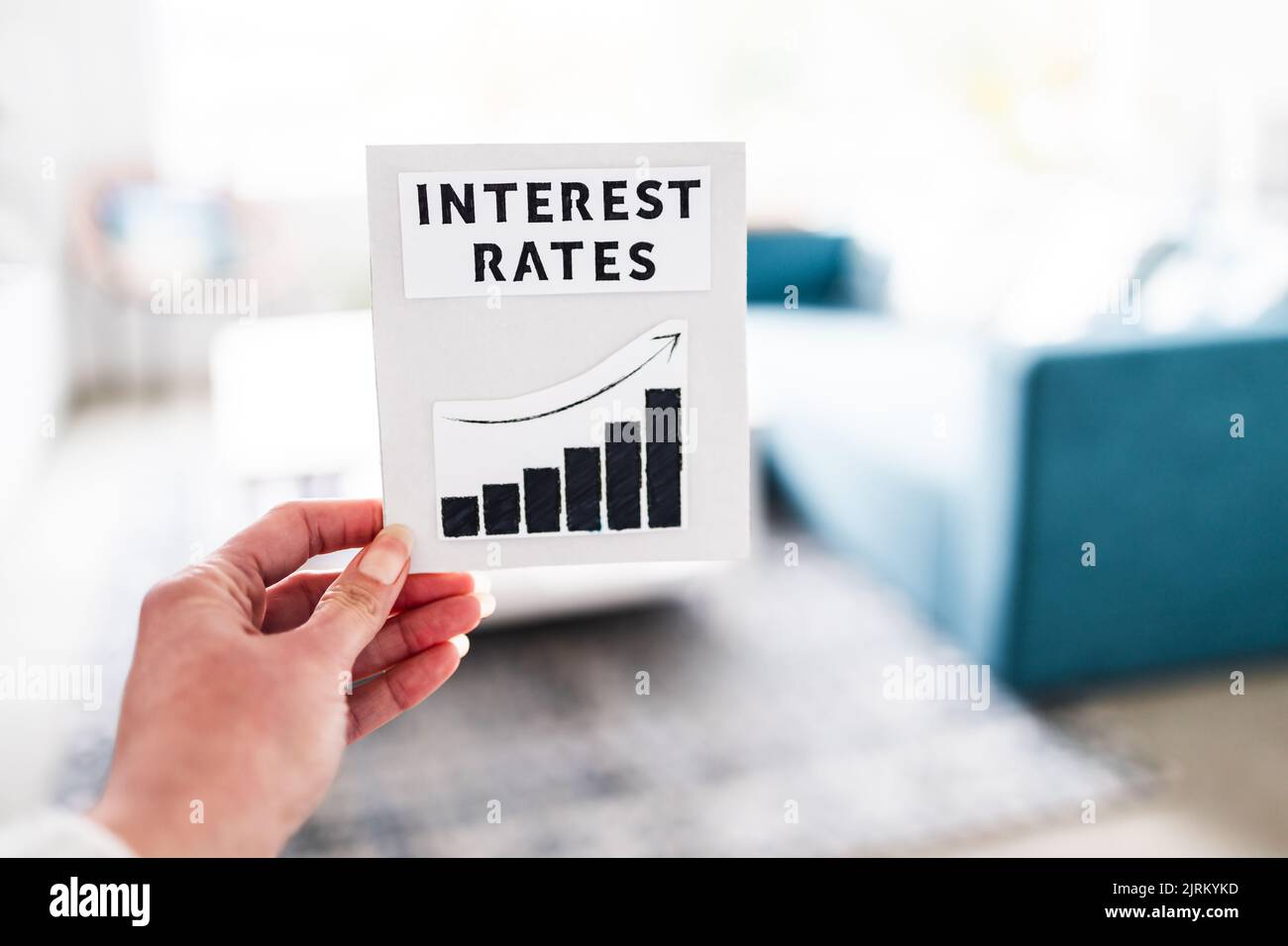 property affordabilikty and home loan payment increases, hand holding ...