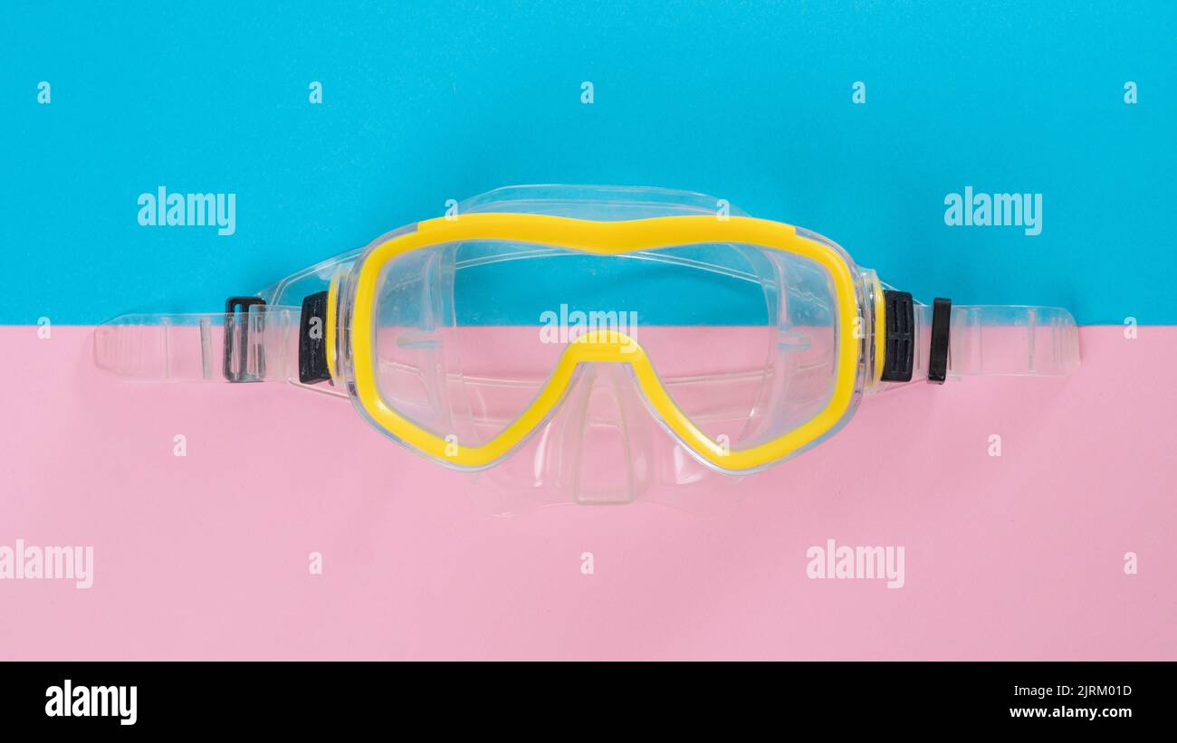 Yellow underwater snorkeling mask on a two-tone background Stock Photo ...