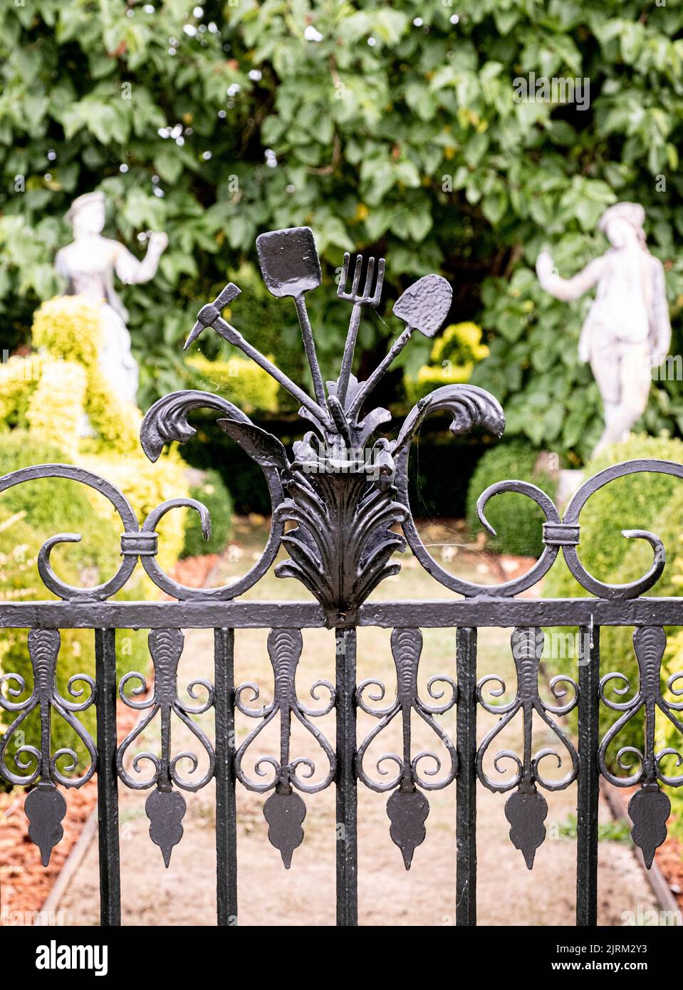 Humourous ironwork detail on one of the garden gates at Eythrope ...