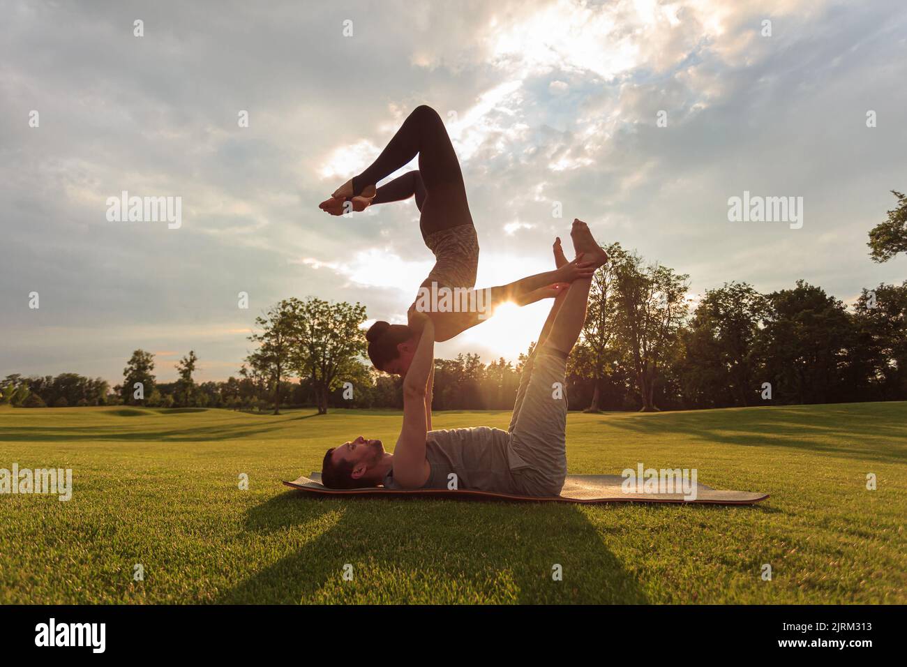 Acrobatic pose hi-res stock photography and images - Alamy