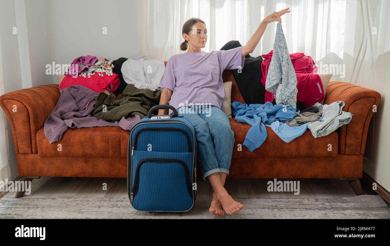Suitcase packing mess hi-res stock photography and images - Alamy