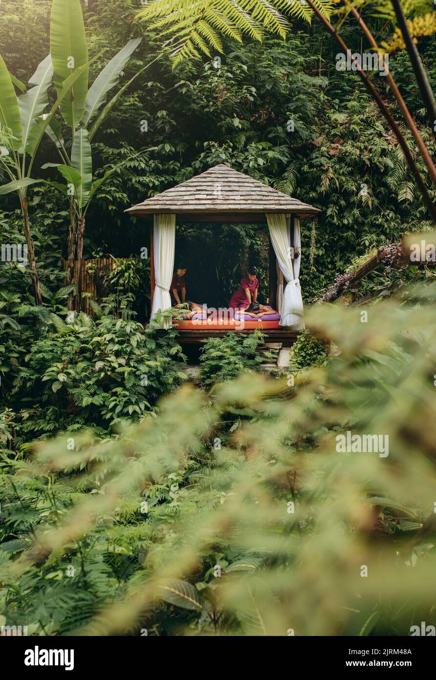 Shot of outdoor spa center at luxury resort. Massage pavilion in nature ...
