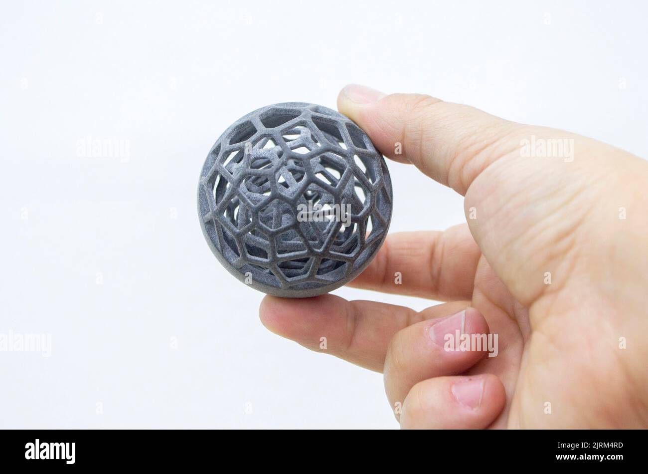 Person holding plastic model printed on powder 3d printer from ...