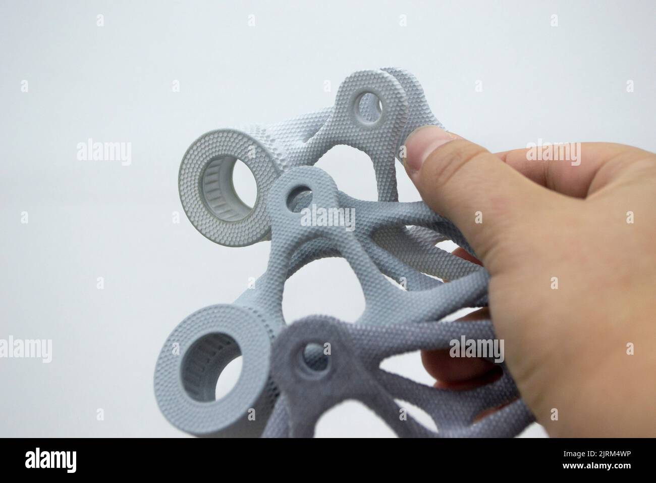 Person holding plastic model printed on powder 3d printer from ...