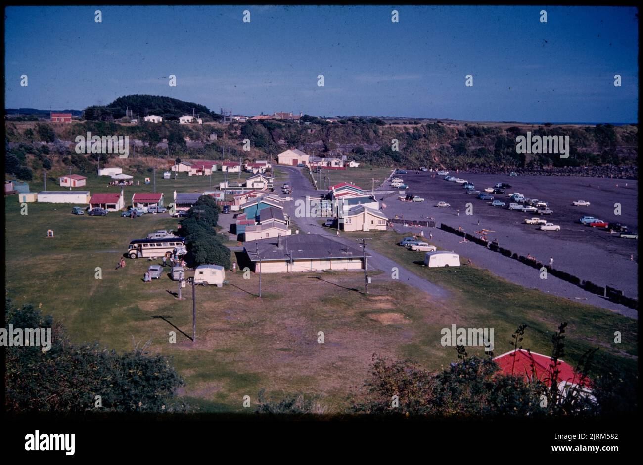 Panorama of Opunake Cove showing its attractive wide shelving beach ...