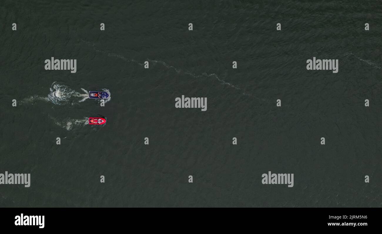 Two speed boats on water, top view. Aerial view sport motor boat and ...