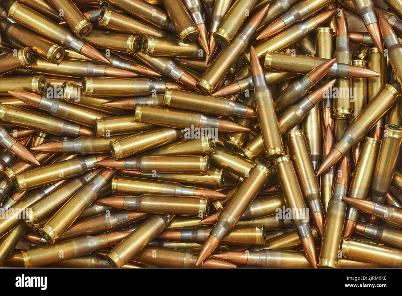 A batch of uniform cartridges piled on top of each other Stock Photo ...