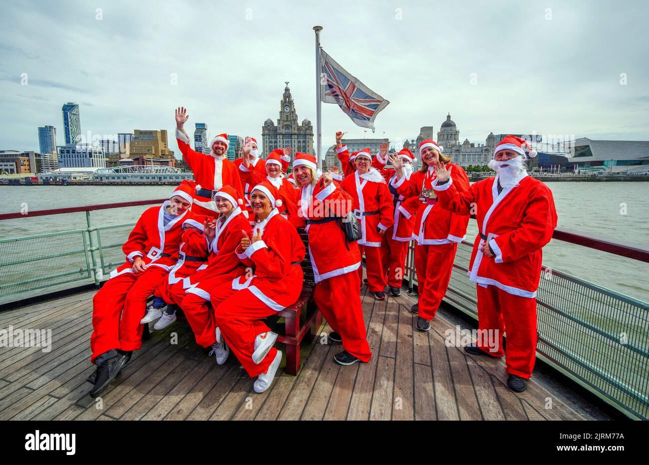 People dressed as Santa Claus on a Mersey Ferry during a photo call for ...