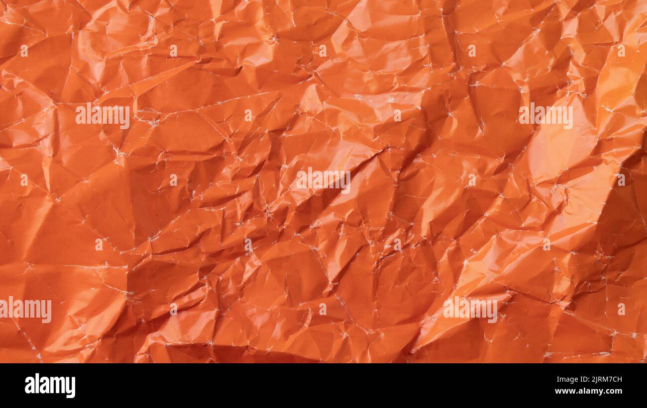 Wrinkled colored paper background texture voluminous orange Stock Photo ...