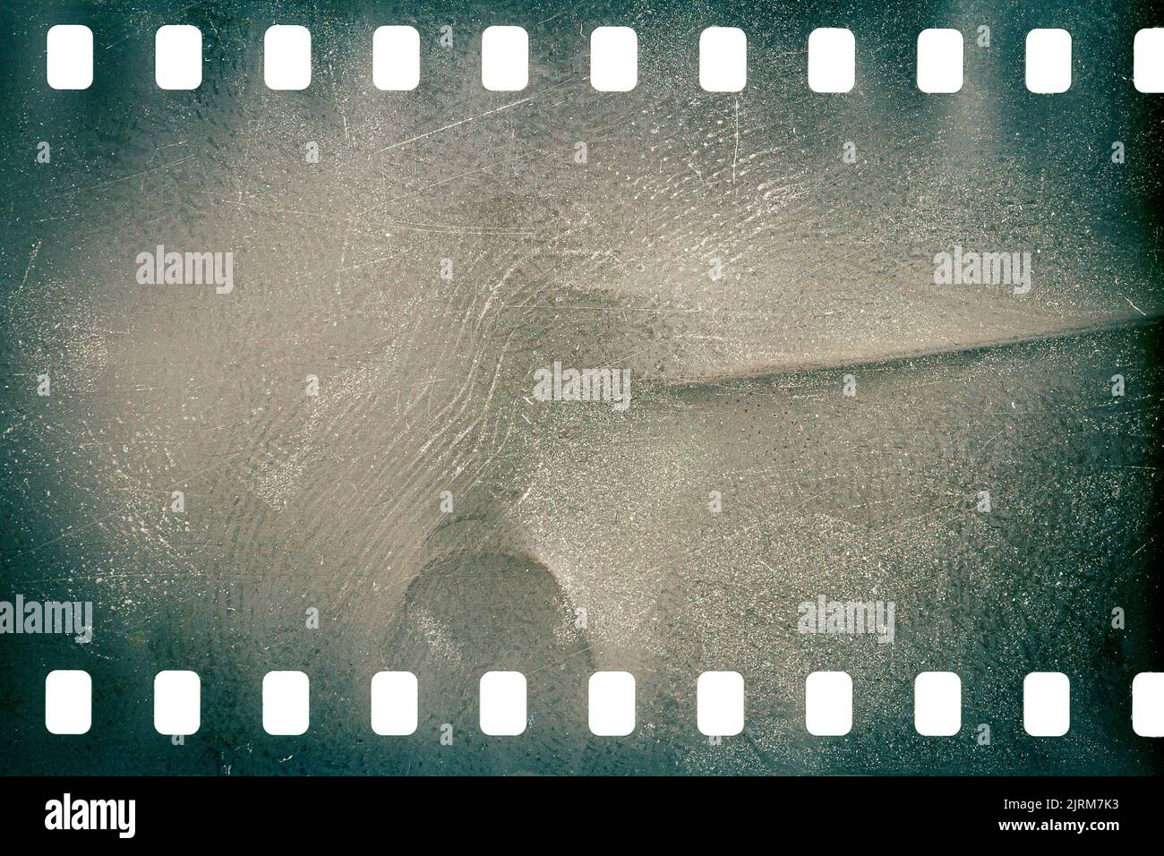 Dusty and grungy 35mm film texture or surface. Perforated scratched ...