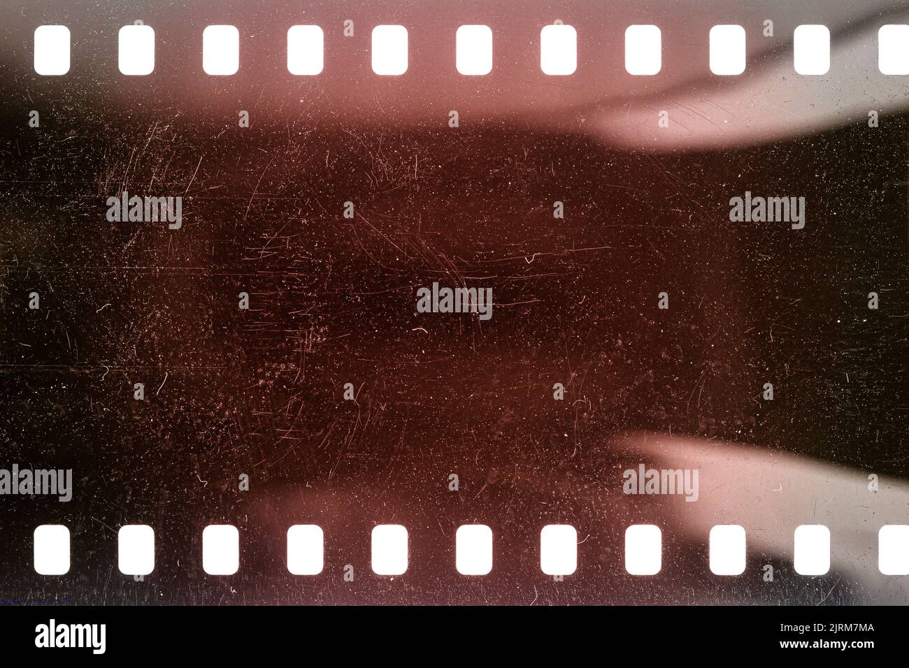 Dusty and grungy 35mm film texture or surface. Perforated scratched ...
