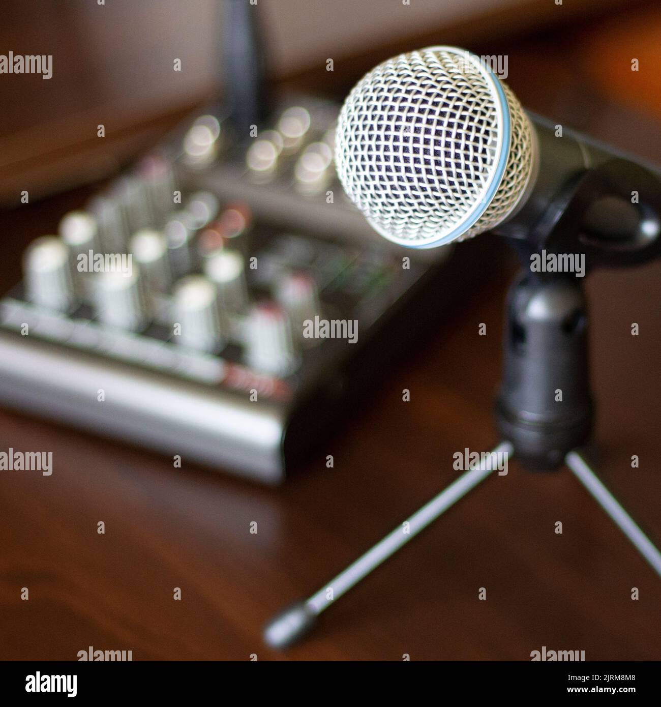 Microphone and mixer on the table. Recording studio, radio podcast ...