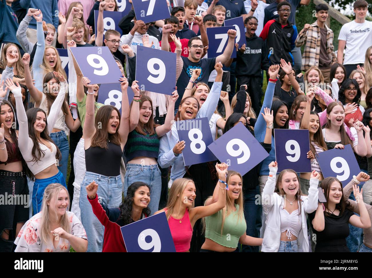 Students celebrate after receiving their GCSE results at The Grammar School in Leeds, Yorkshire ...