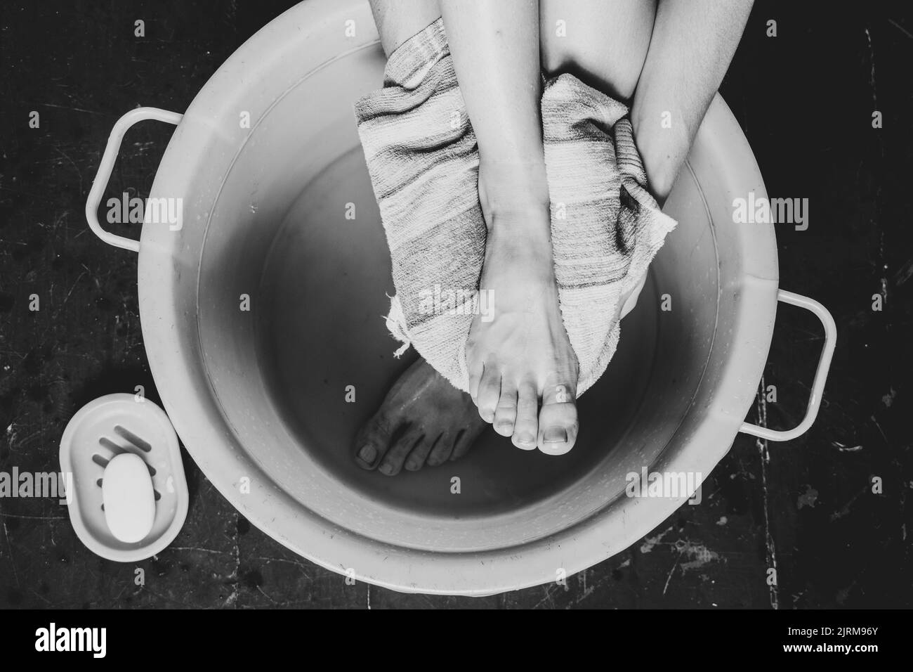 Foot soaking Black and White Stock Photos & Images - Alamy